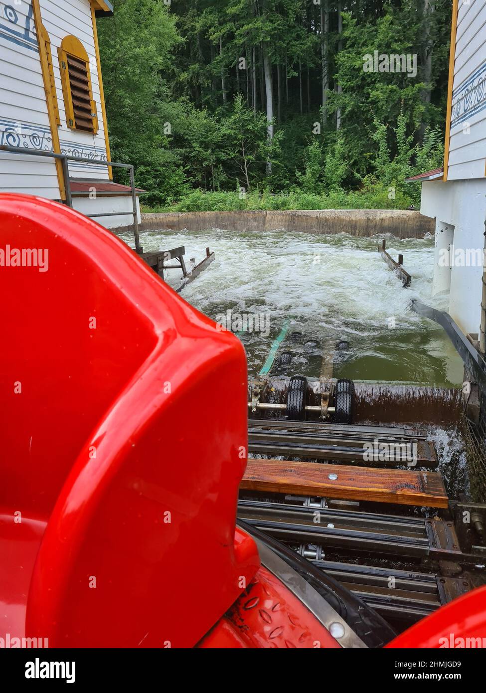 Exciting ride on the raging river of a wild water ride Stock Photo - Alamy