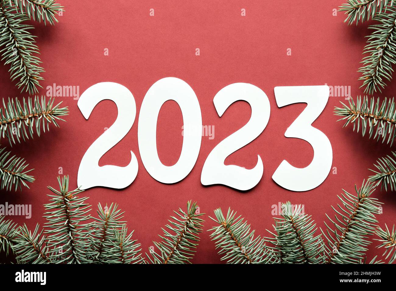 Outline of 2023 paper numbers on red background. Flat lay, top view ...