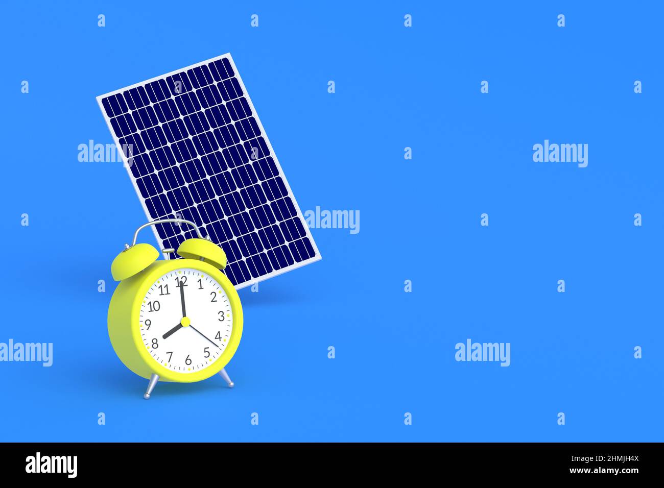 Solar panel near alarm clock on blue background. Lifetime of ...