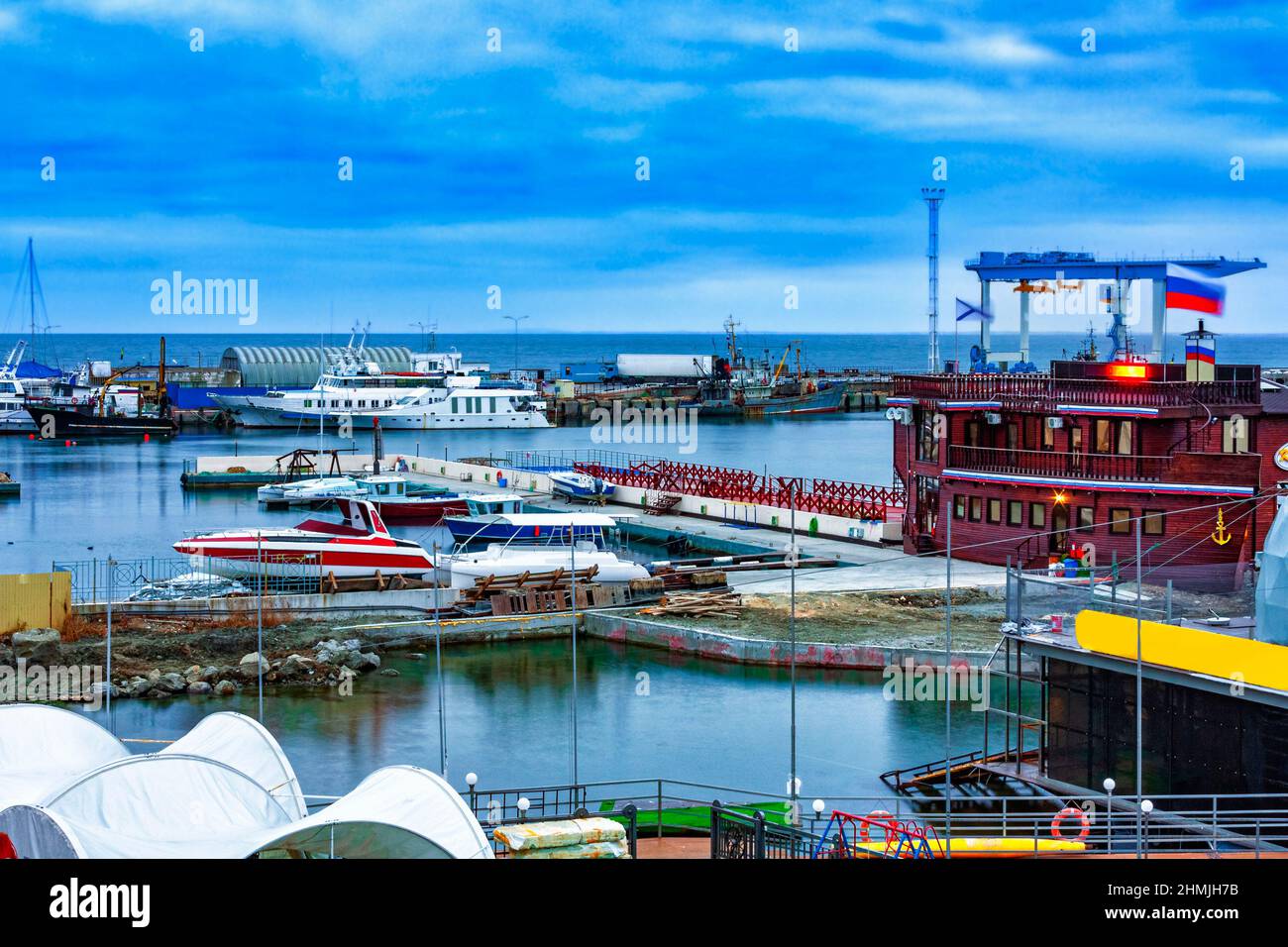 Small yacht in seaport hi-res stock photography and images - Alamy