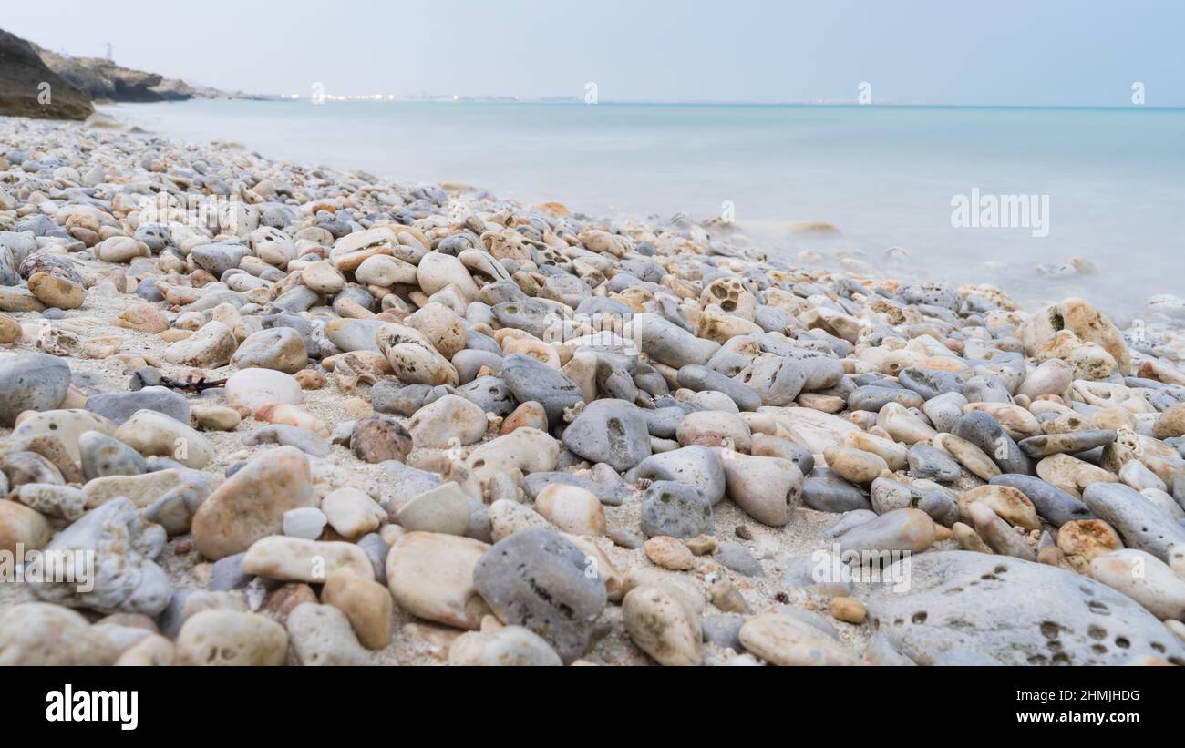Beautiful Jebel Fuwairit Beach landscape with pebbles in Qatar Stock ...