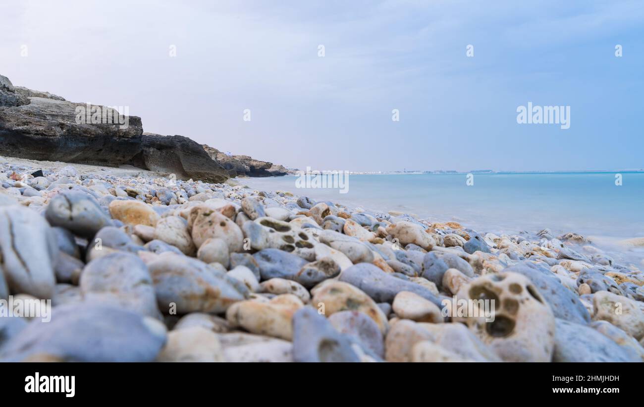 Beautiful Jebel Fuwairit Beach landscape with pebbles in Qatar Stock ...