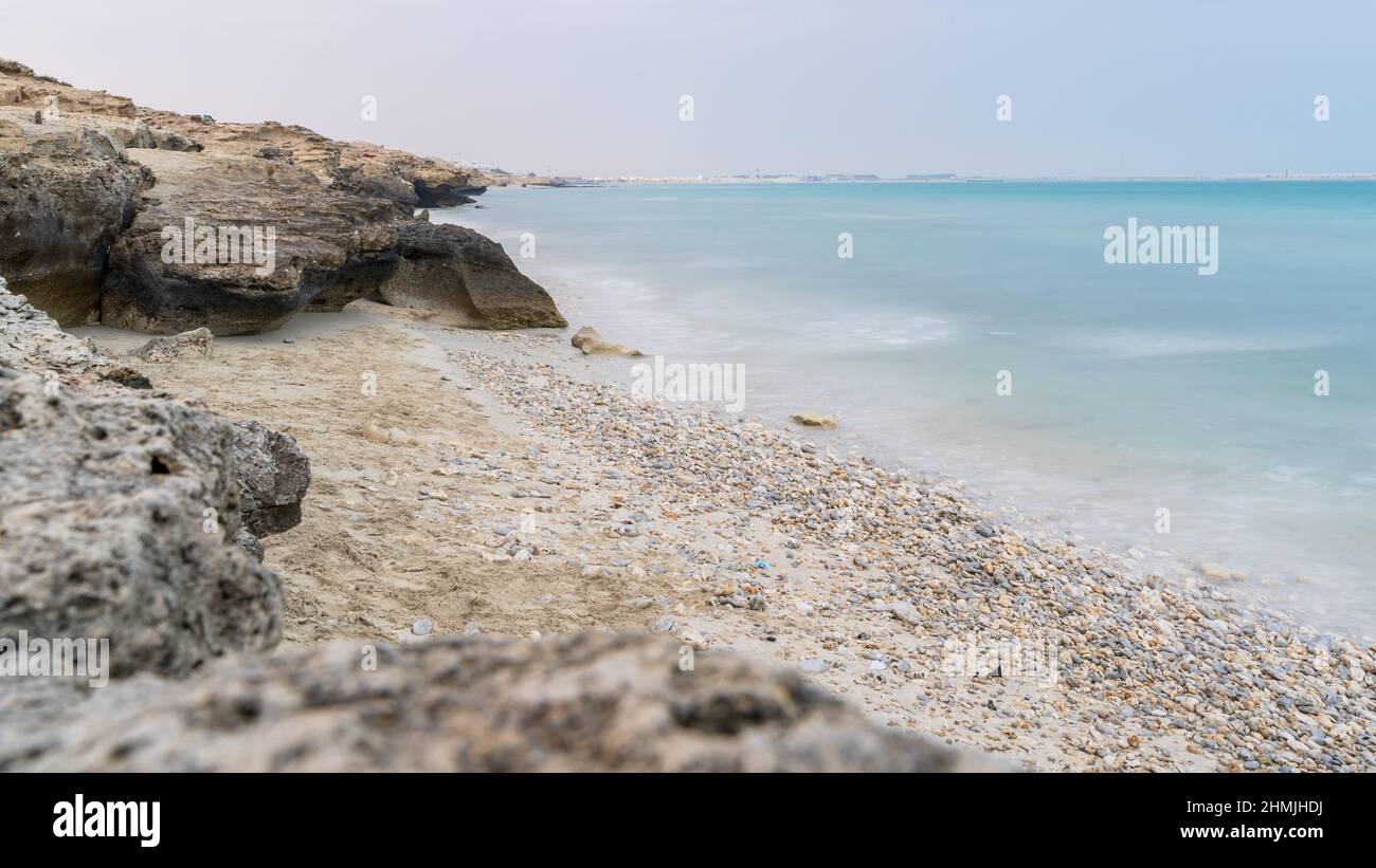 Beautiful Jebel Fuwairit Beach landscape with pebbles in Qatar Stock ...