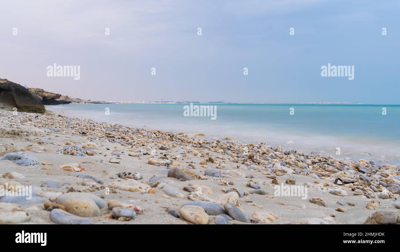 Beautiful Jebel Fuwairit Beach landscape with pebbles in Qatar Stock ...