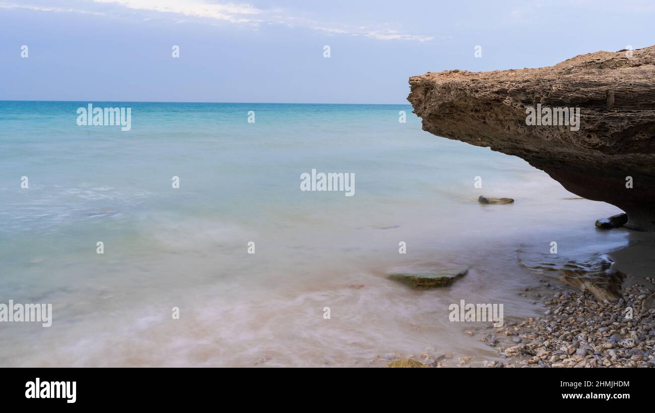 Beautiful Jebel Fuwairit Beach landscape with pebbles in Qatar Stock ...