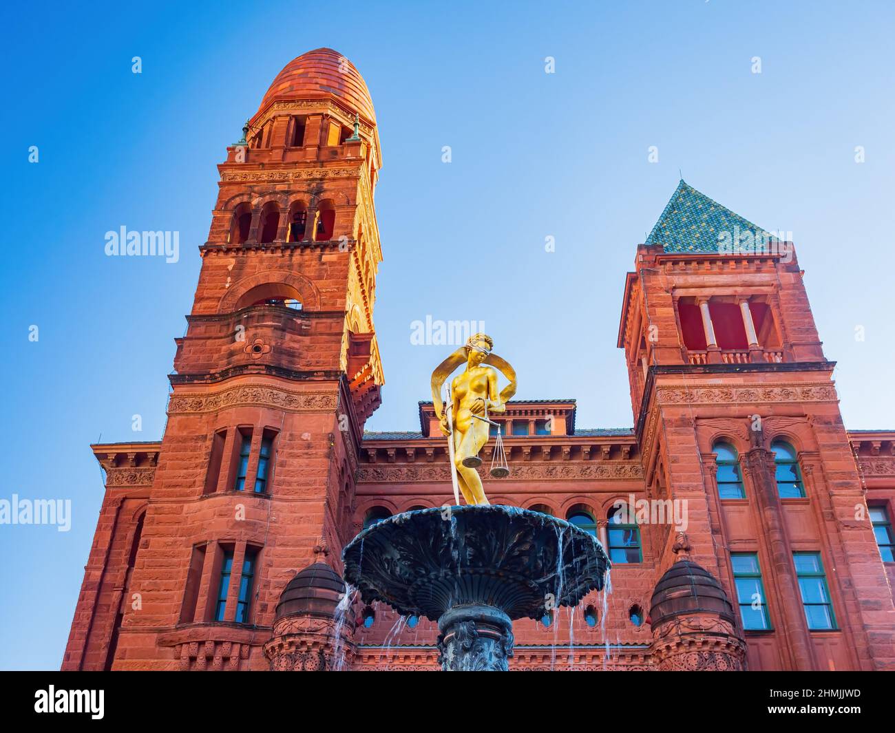 Sunny view of Courthouse building and Lady of Justice statue at Texas ...