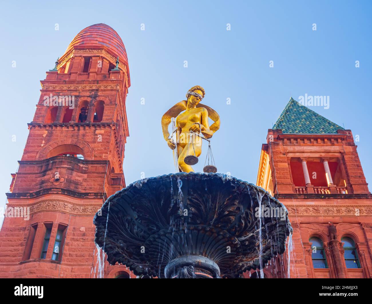Sunny view of Courthouse building and Lady of Justice statue at Texas ...