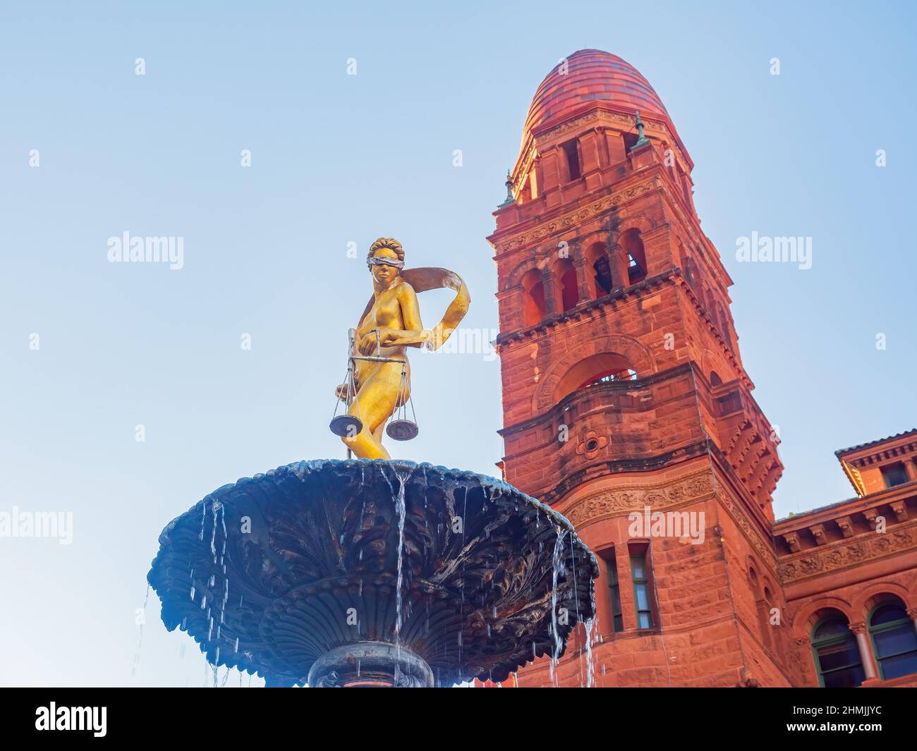 Sunny view of Courthouse building and Lady of Justice statue at Texas ...