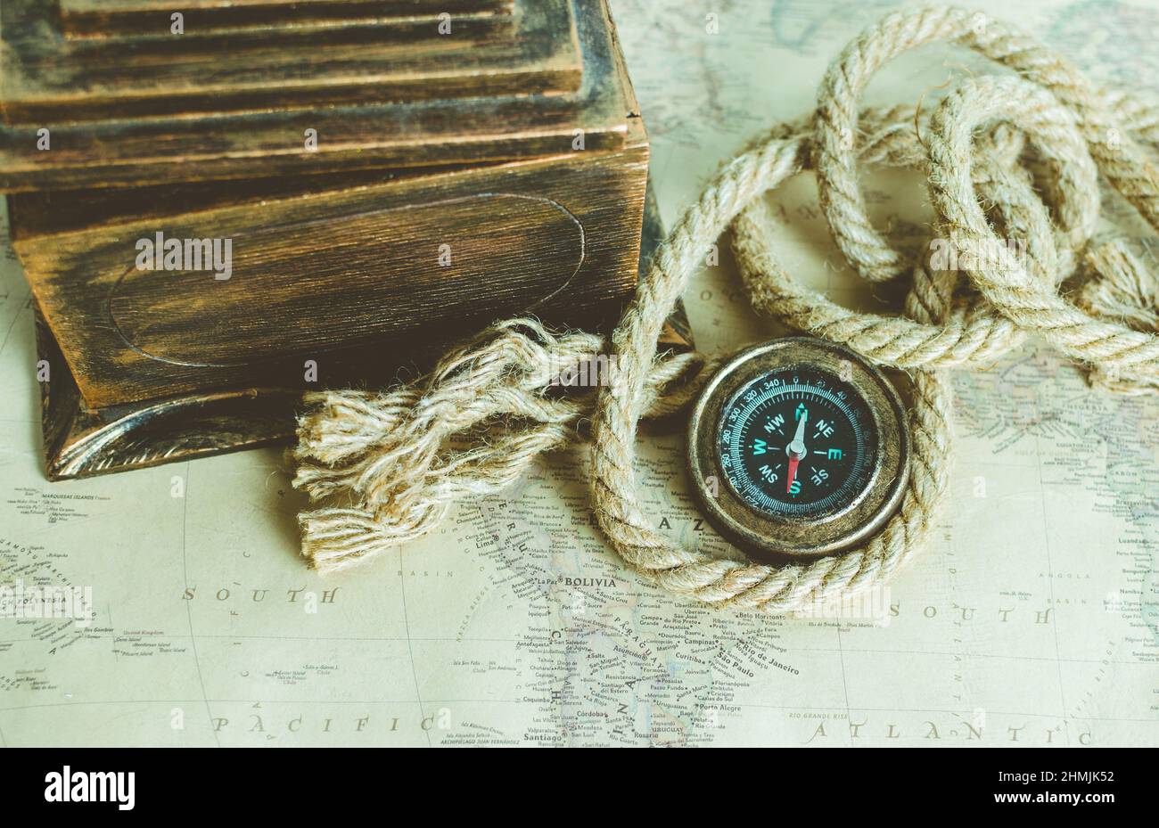 Compass, rope and old box on the old map Stock Photo - Alamy
