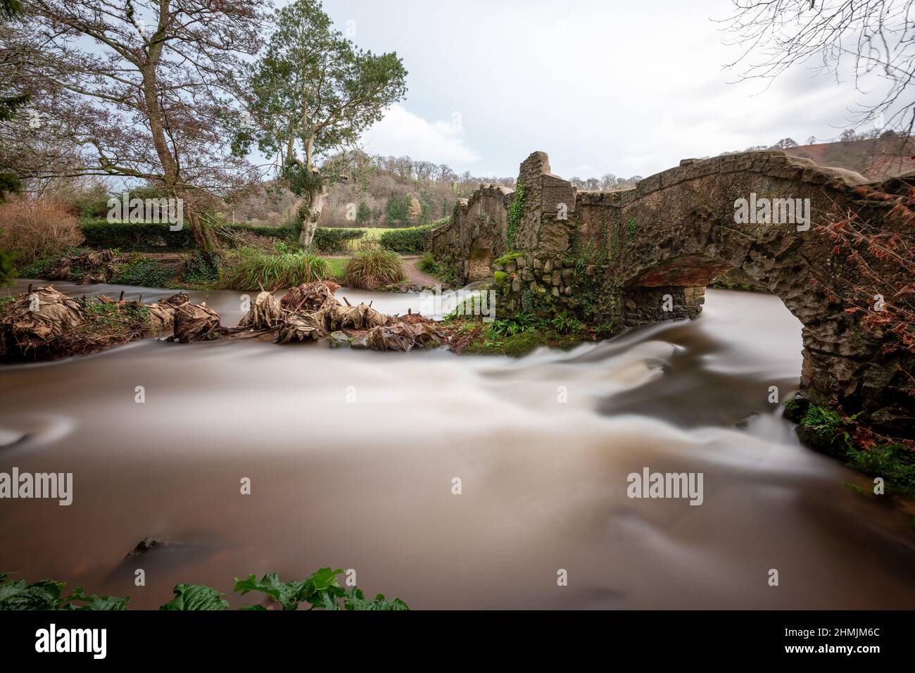 Long exposure of the river Avill flowing under Lovers bridge in the ...