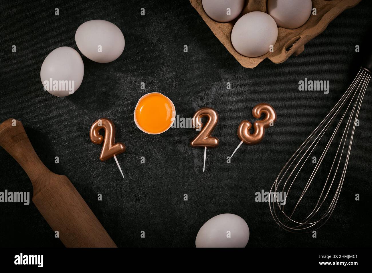 Creative Happy New Year 2023 greeting card for home baker. Numbers made ...