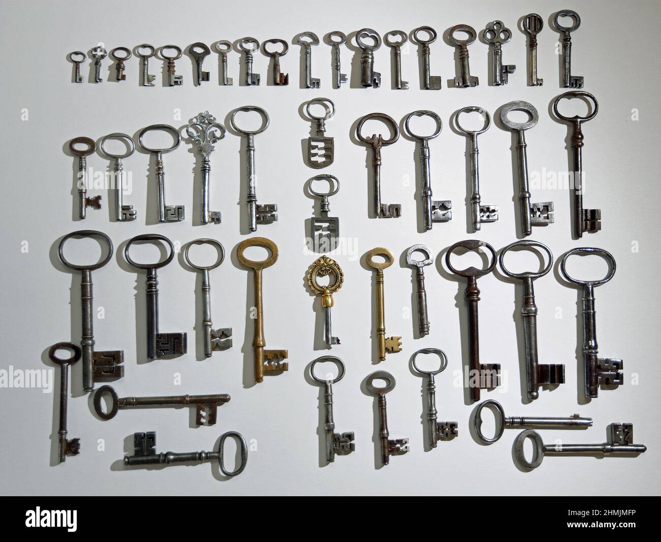 A Collection of 48 Antique Keys on white background Stock Photo - Alamy