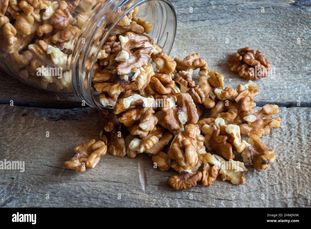 Walnuts in a glass jar Stock Photo - Alamy