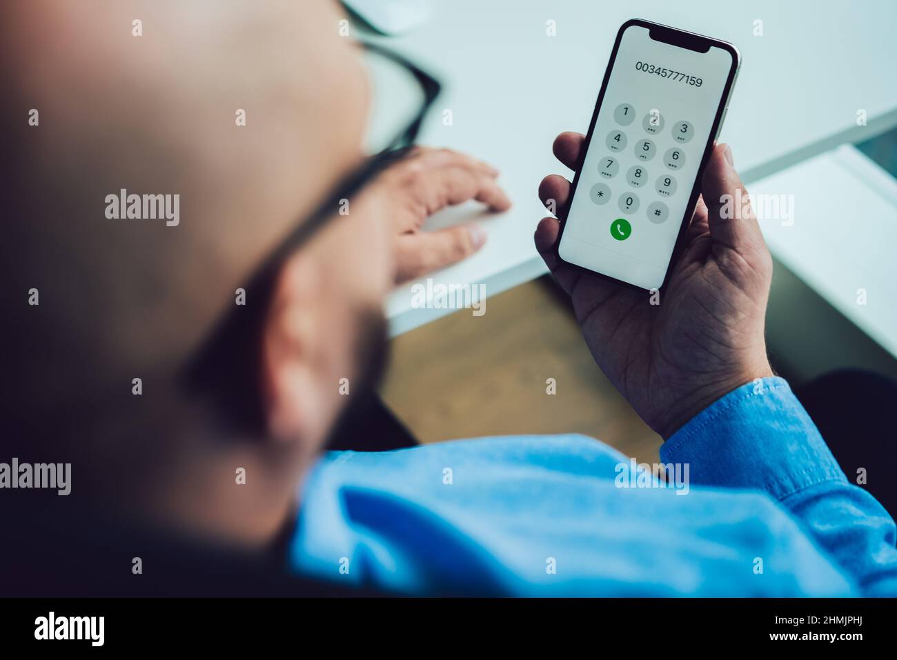 Crop unrecognizable man using modern smartphone Stock Photo - Alamy