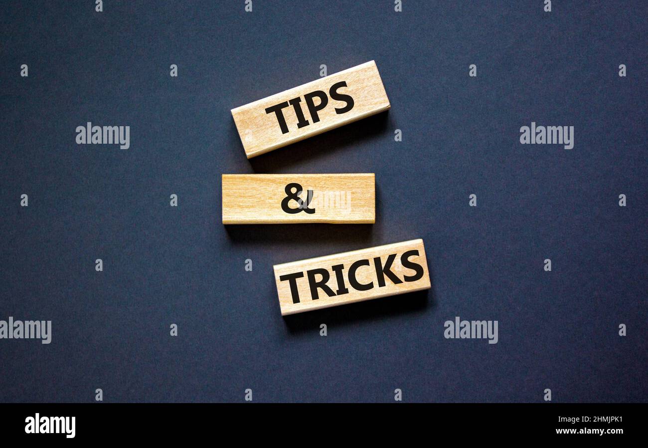 Tips and tricks symbol. Concept words Tips and tricks on wooden blocks ...