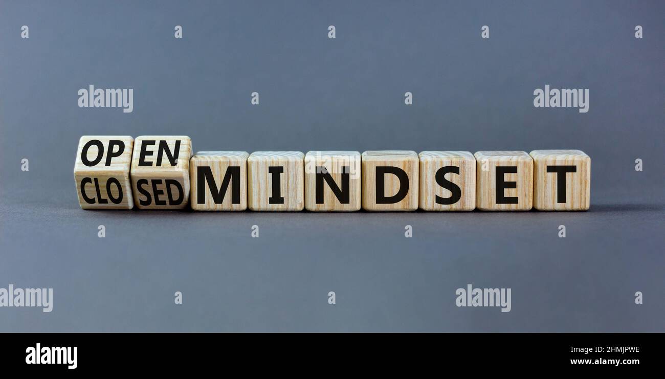 Open or closed mindset symbol. Turned wooden cubes and changed concept ...
