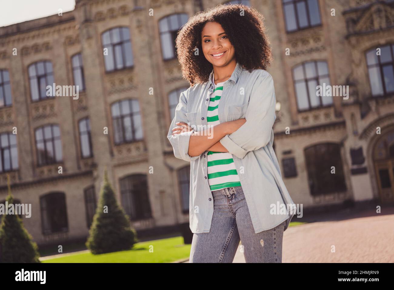 Portrait of attractive content cheerful girl traveler spending holiday ...