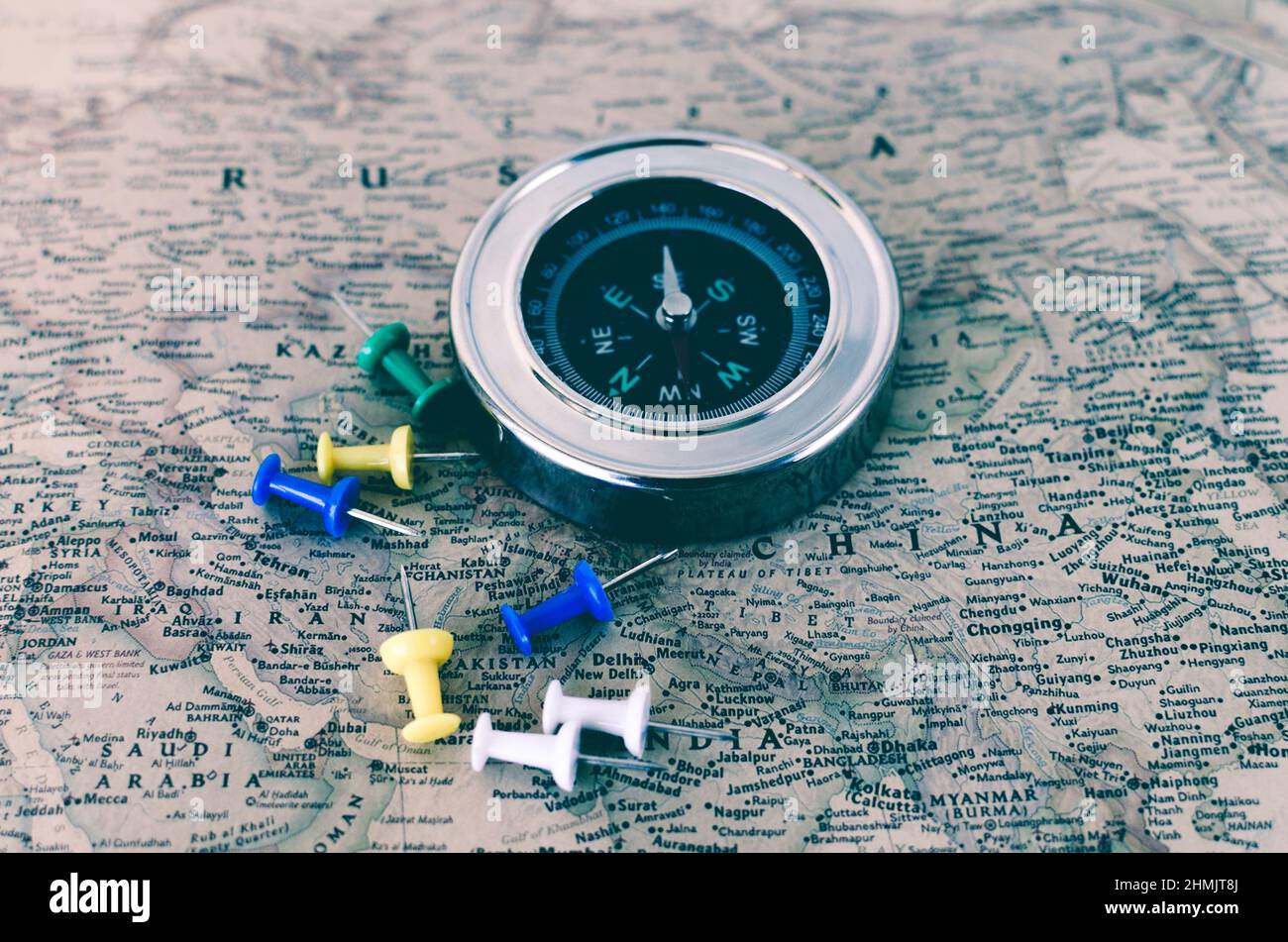 Compass and buttons on the old map between Russia and China Stock Photo ...