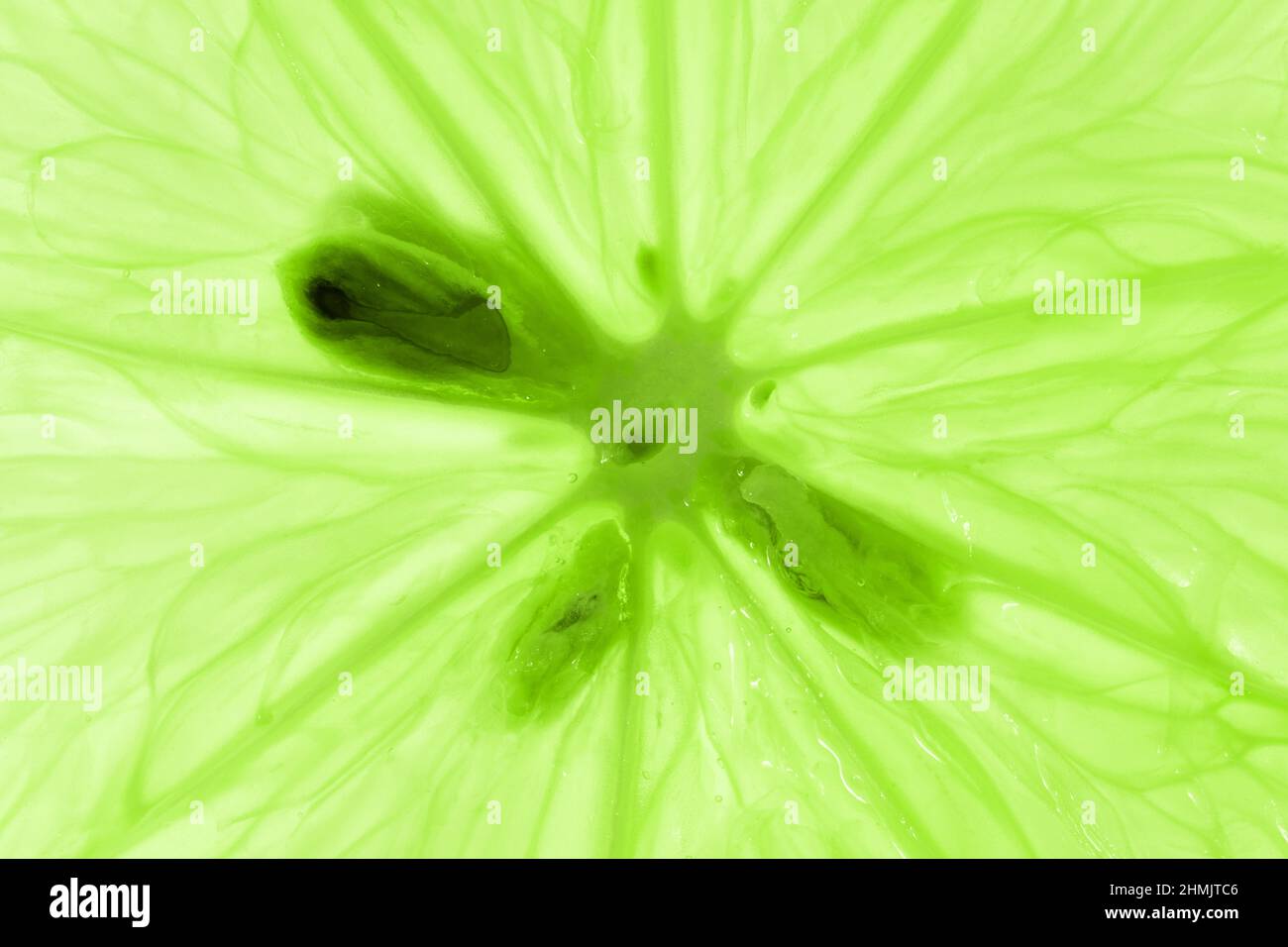 Transparent lemon texture with a green tint. Macro close-up of a lemon ...
