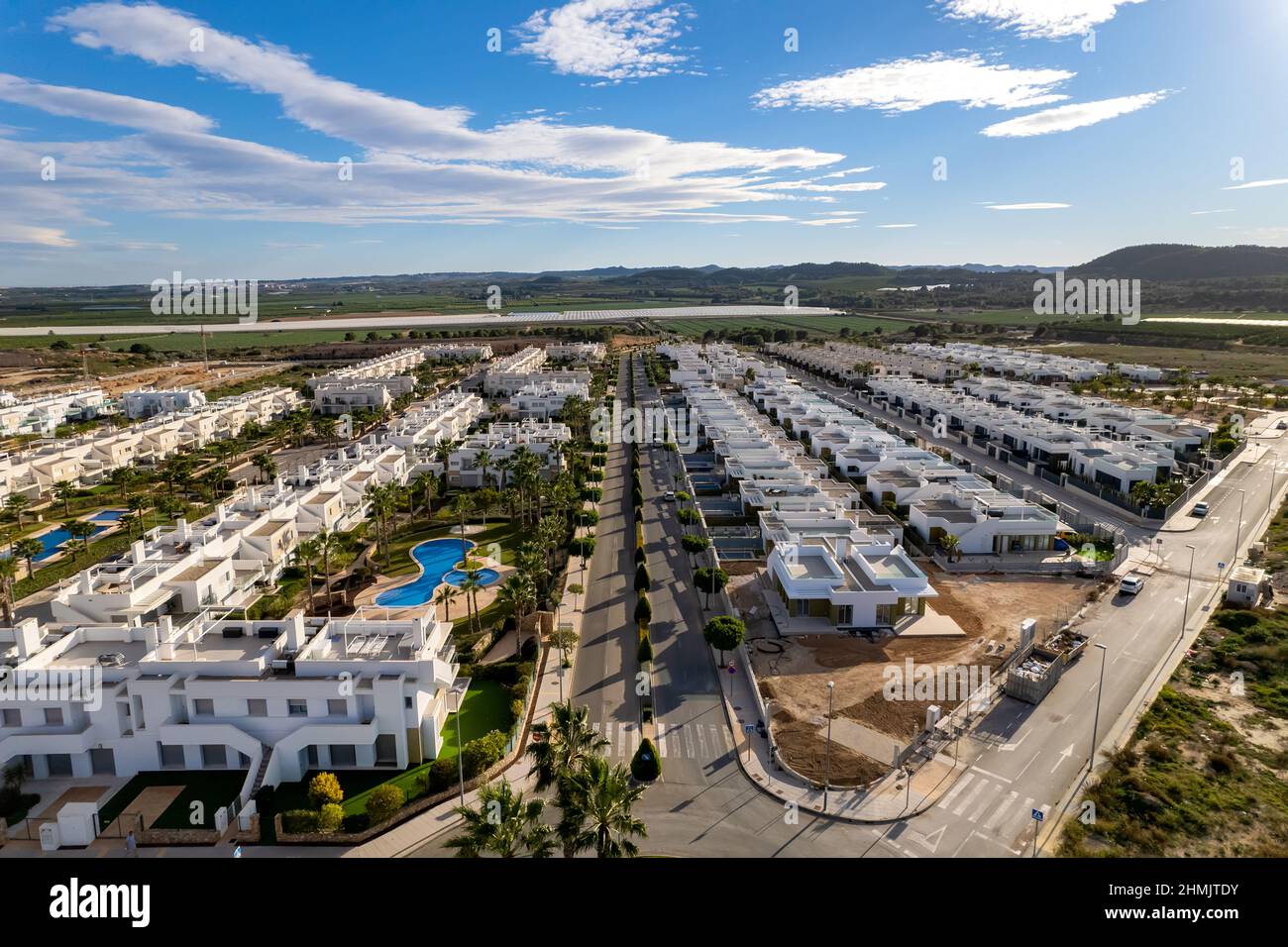 Newly built, modern high-tech residential buildings with swimming pool ...
