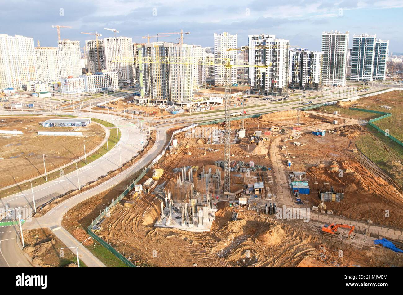 Construction site with tower cranes on formwork building construction ...