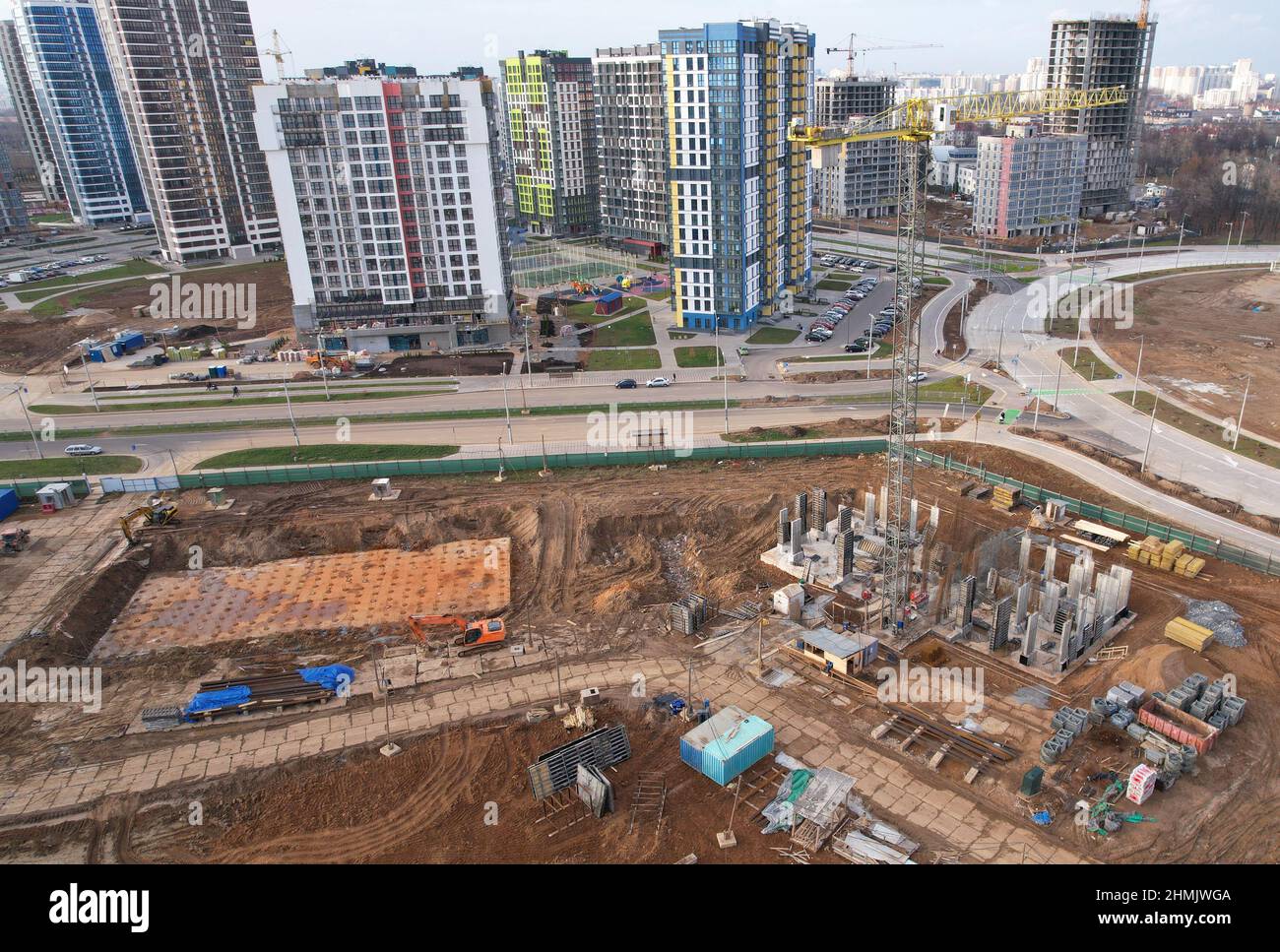 Construction site with tower cranes on formwork building construction ...
