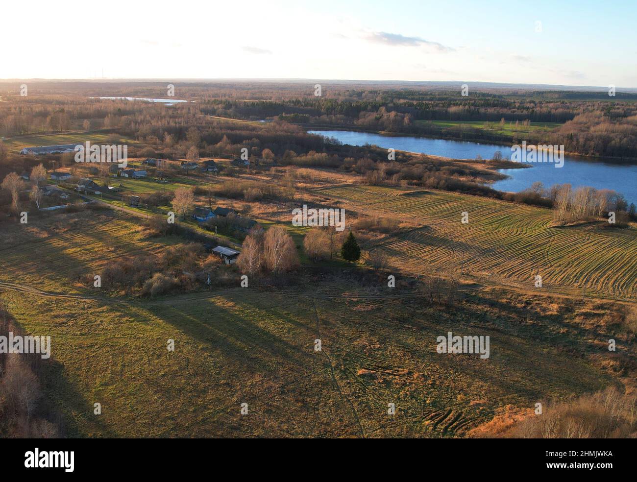 Wooden home in village at lake. Country houses in countryside. Suburban ...