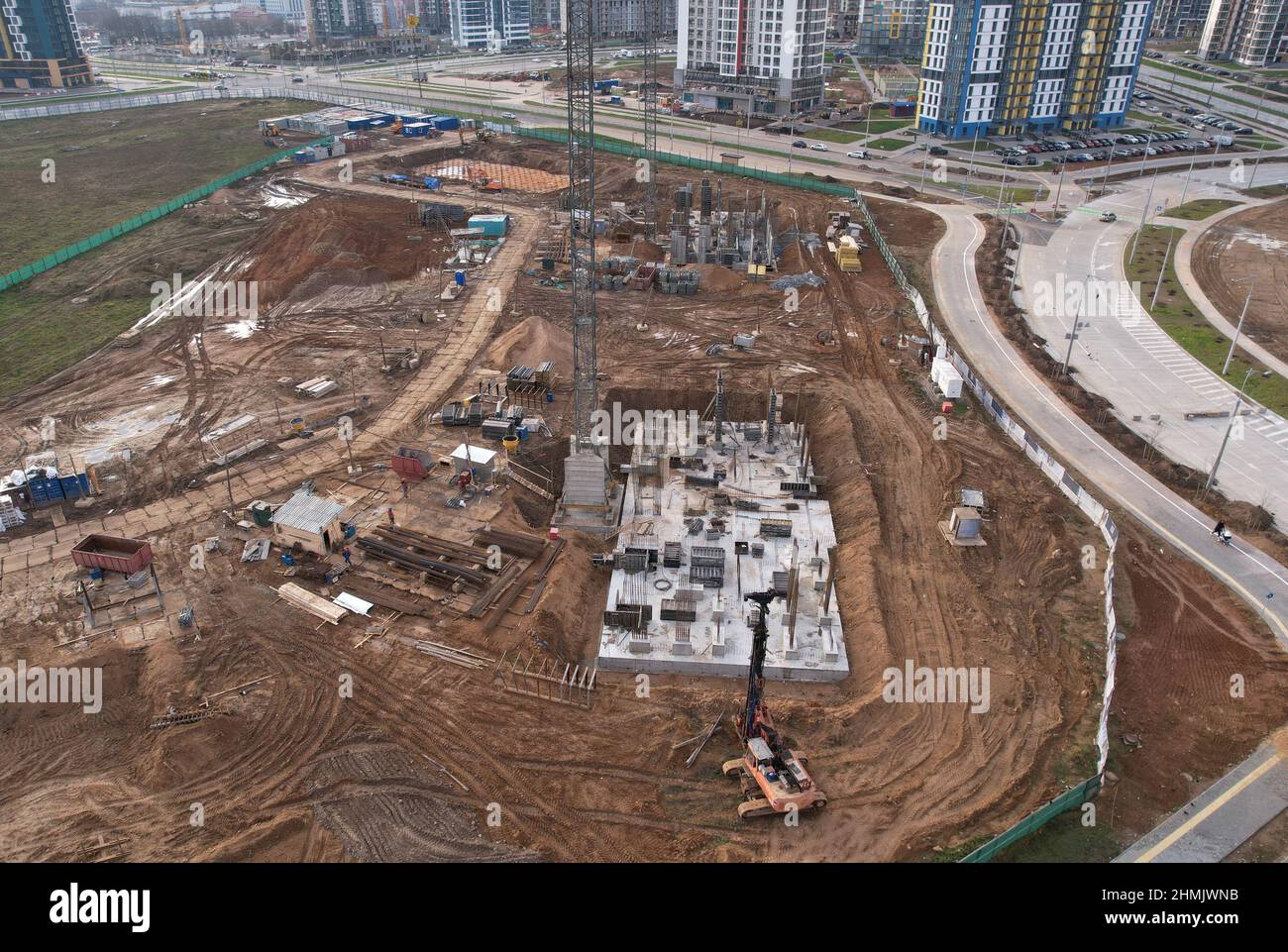 Construction site with tower cranes on formwork building construction ...