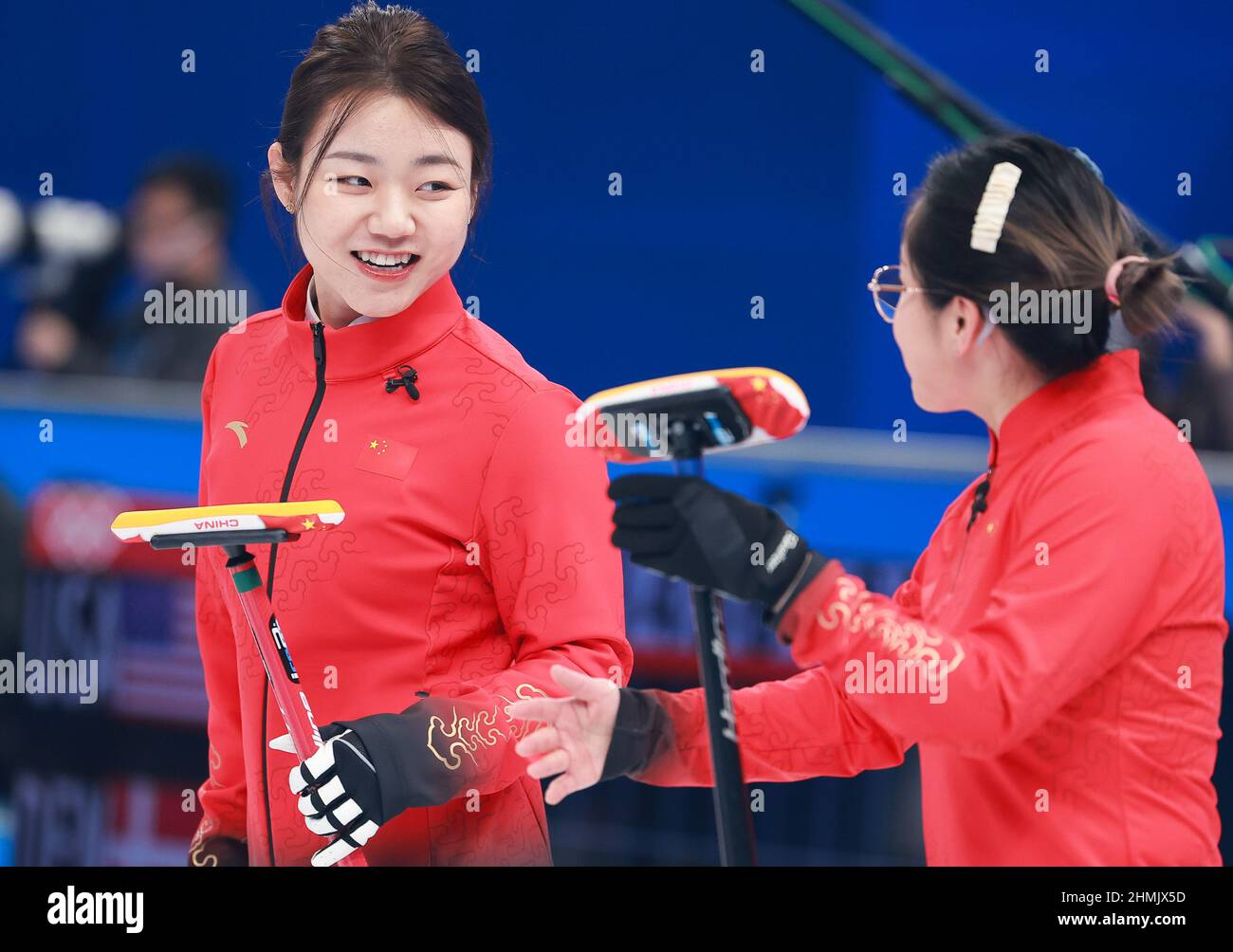 Beijing, China. 10th Feb, 2022. Han Yu (L) communicate with her ...