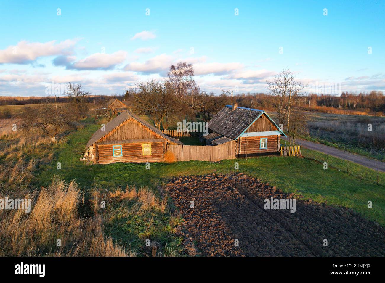 Wooden home in village. Country houses in countryside. Suburban house ...