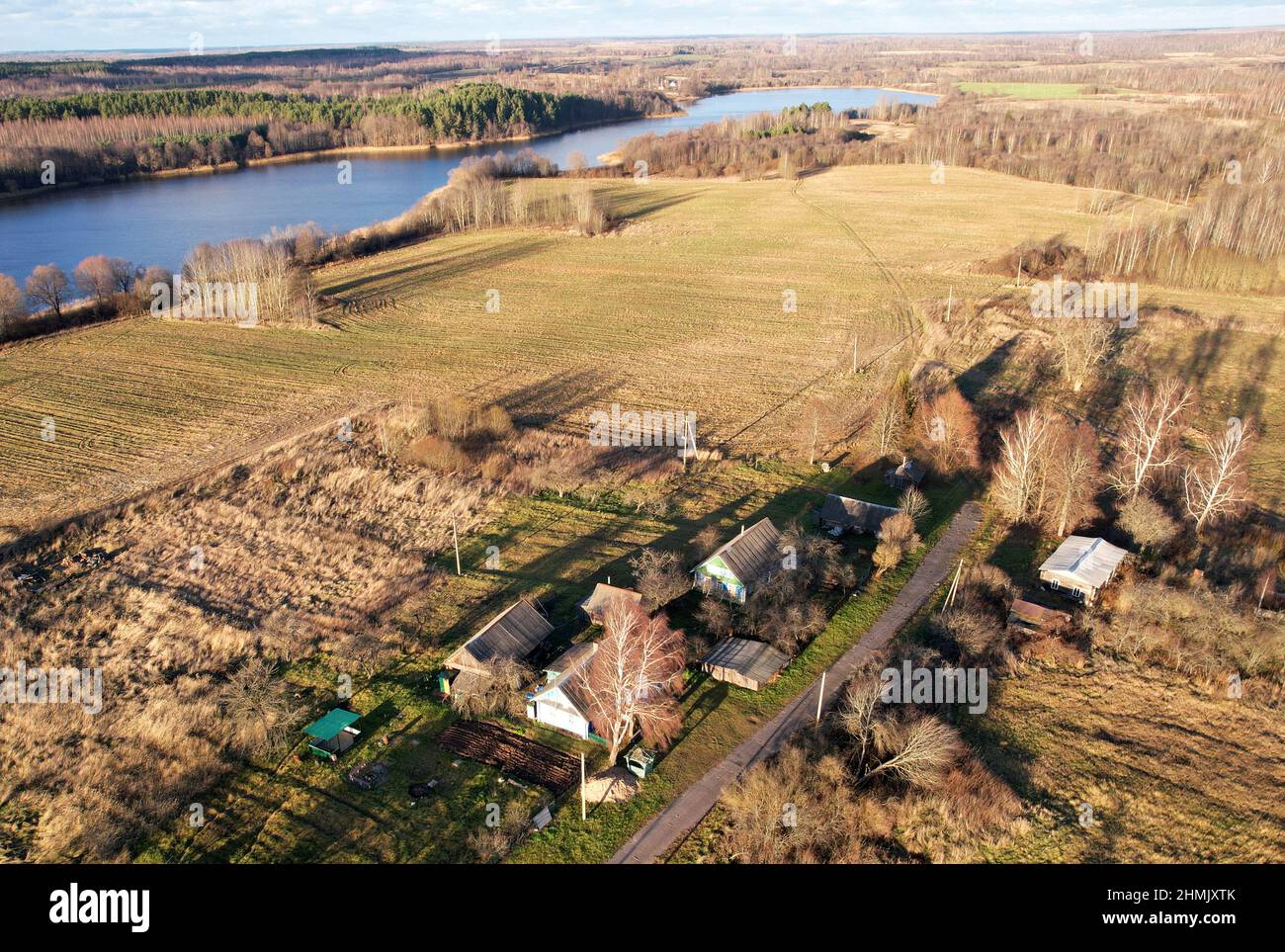 Wooden home in village at lake. Country houses in the countryside ...