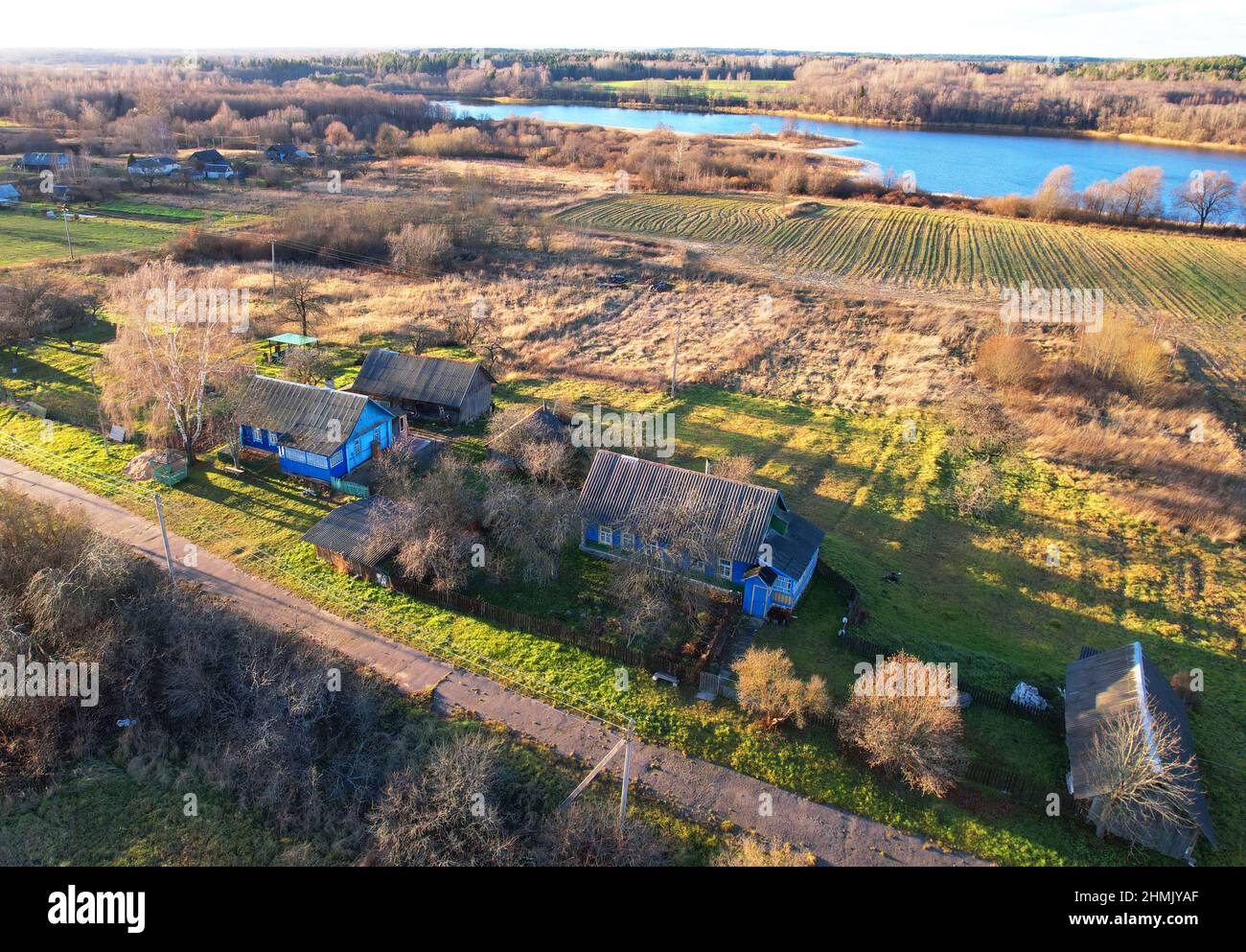 Wooden home in village at lake. Country houses in the countryside ...
