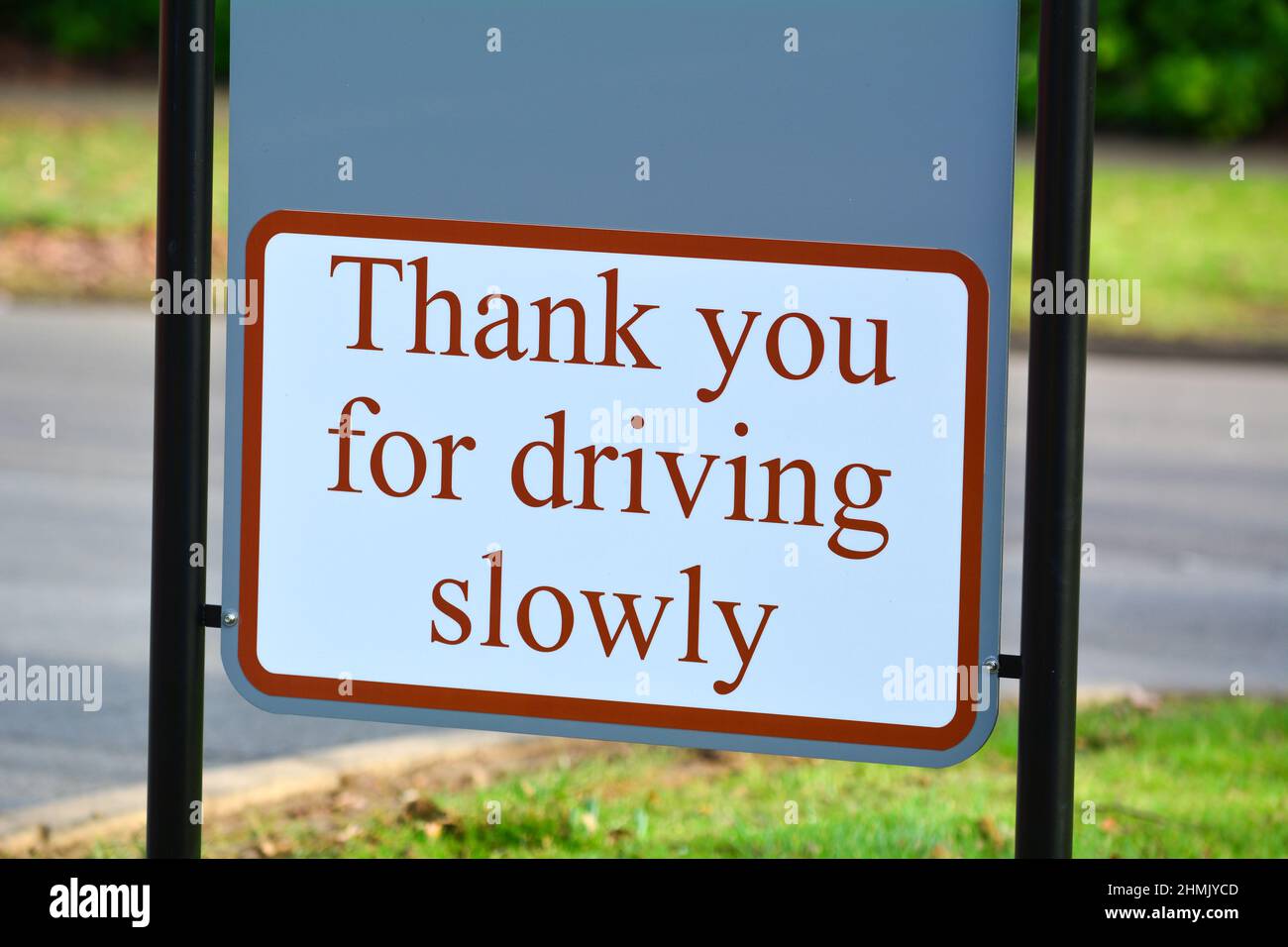 Drive slowly signs UK Stock Photo - Alamy