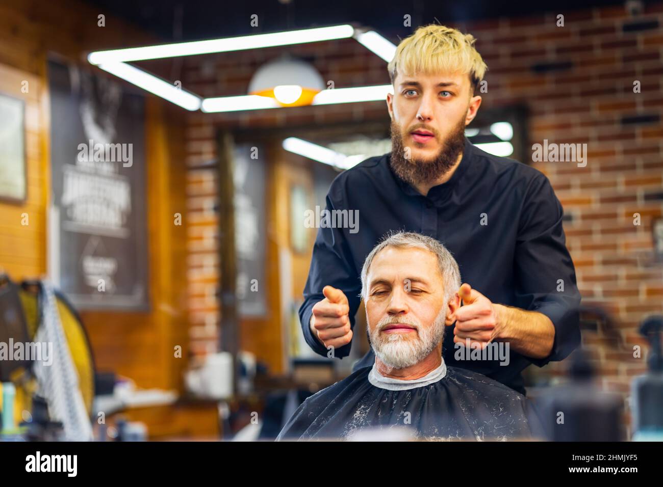 Visiting the barber hi-res stock photography and images - Alamy