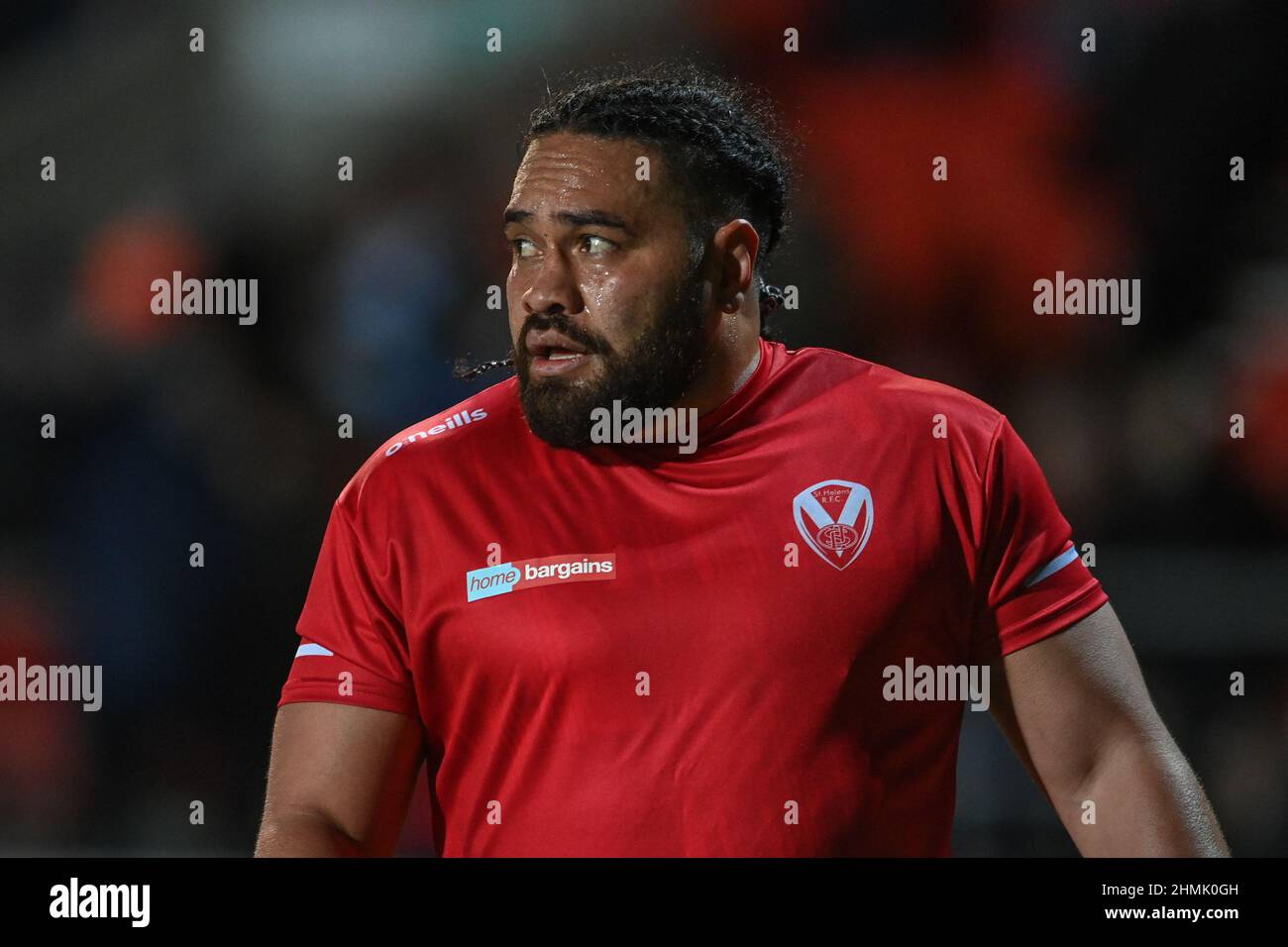 Konrad Hurrell #23 of St Helens during pre-game warm up Stock Photo - Alamy
