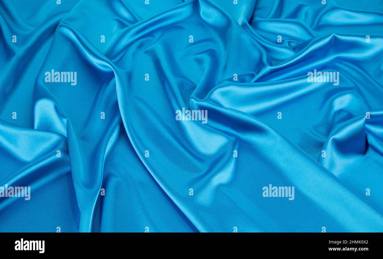Light blue silk texture cloth. Whole background Stock Photo - Alamy