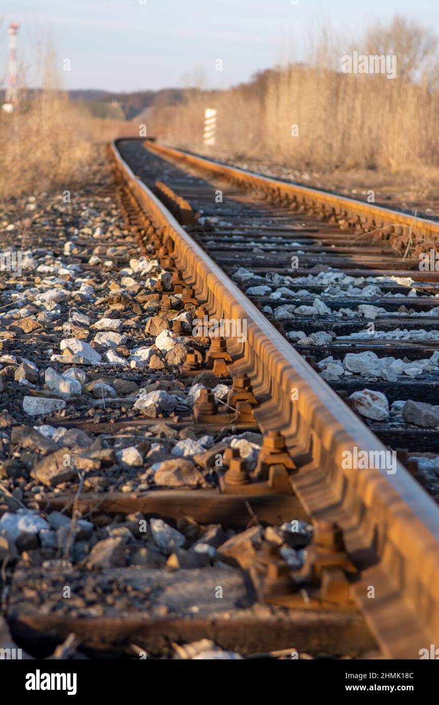 Single track railway line. Empty straight single-way railway line at ...