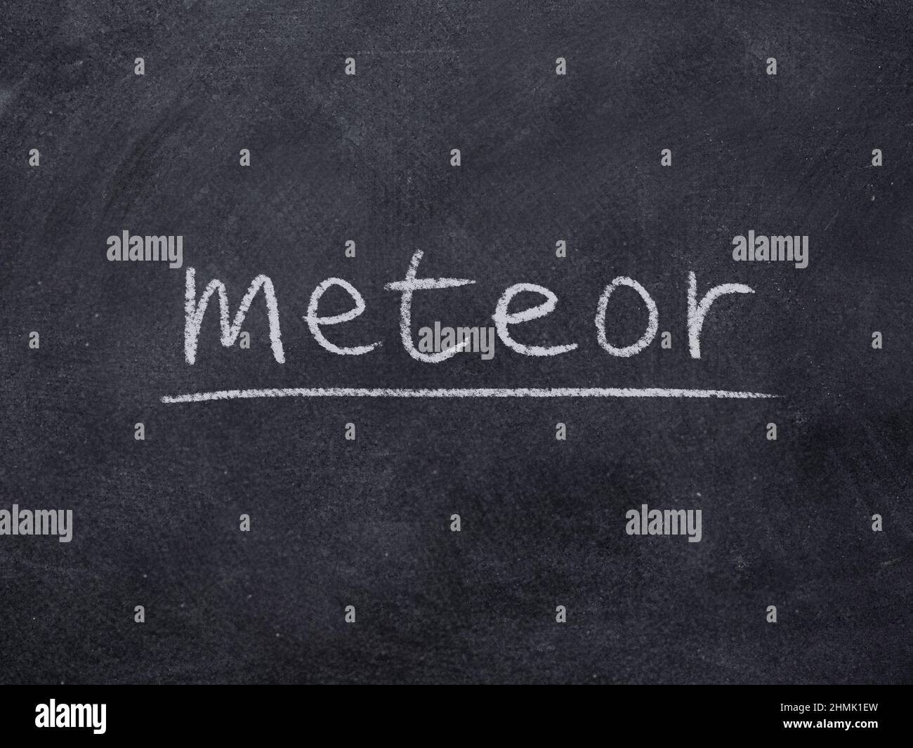 meteor concept word on blackboard background Stock Photo - Alamy