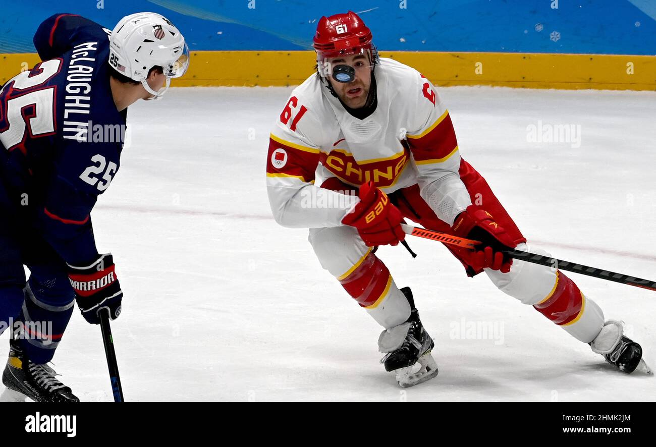 Beijing, China. 10th Feb, 2022. Wei Ruike (R) of China competes during ...