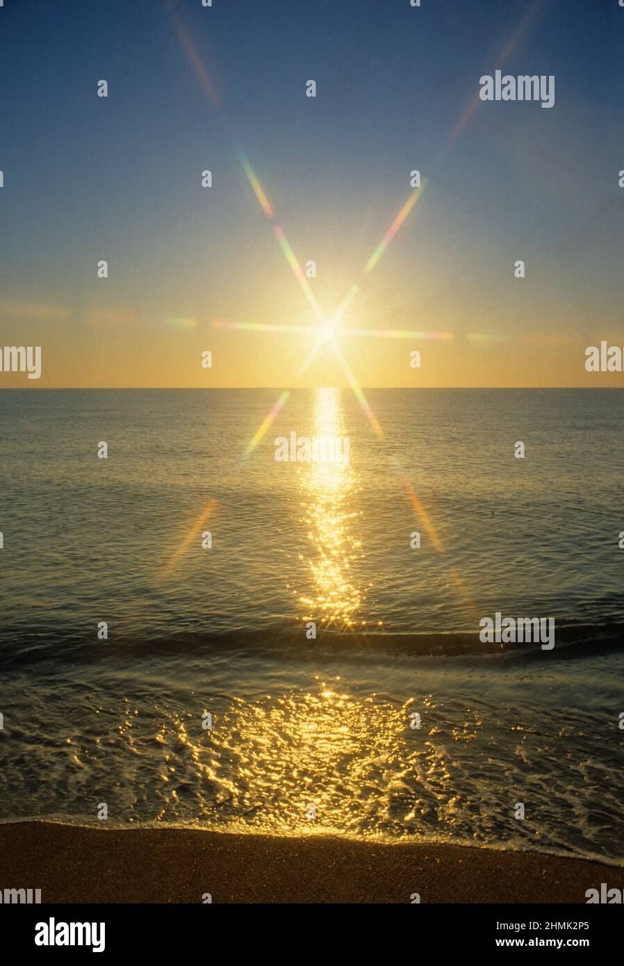 Marine sunrise mediterranean sea sun light effect star Stock Photo - Alamy