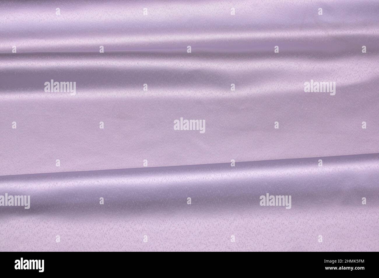 A tessellation made of a pleated, shiny fabric that can be used as a ...