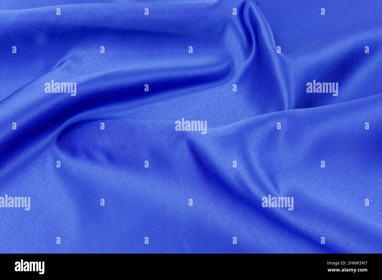 A tessellation made of a pleated, shiny fabric that can be used as a ...