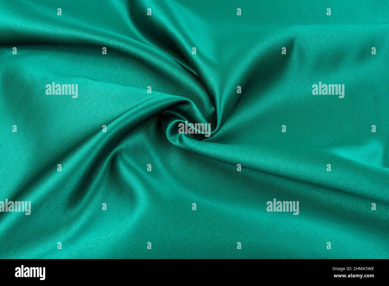 A tessellation made of a pleated, shiny fabric that can be used as a ...
