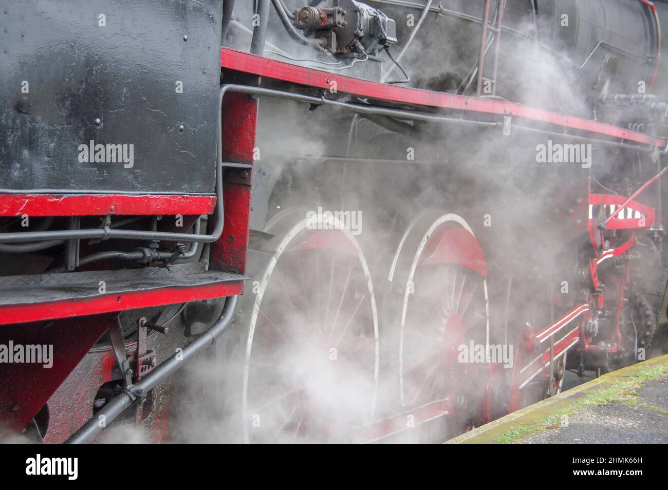 Steam locomotive in clouds of steam Stock Photo - Alamy