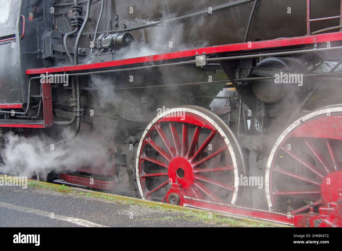 Steam locomotive in clouds of steam Stock Photo - Alamy
