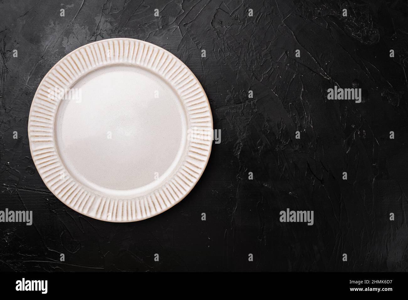 Ceramic empty white plate set with copy space for text or food with ...