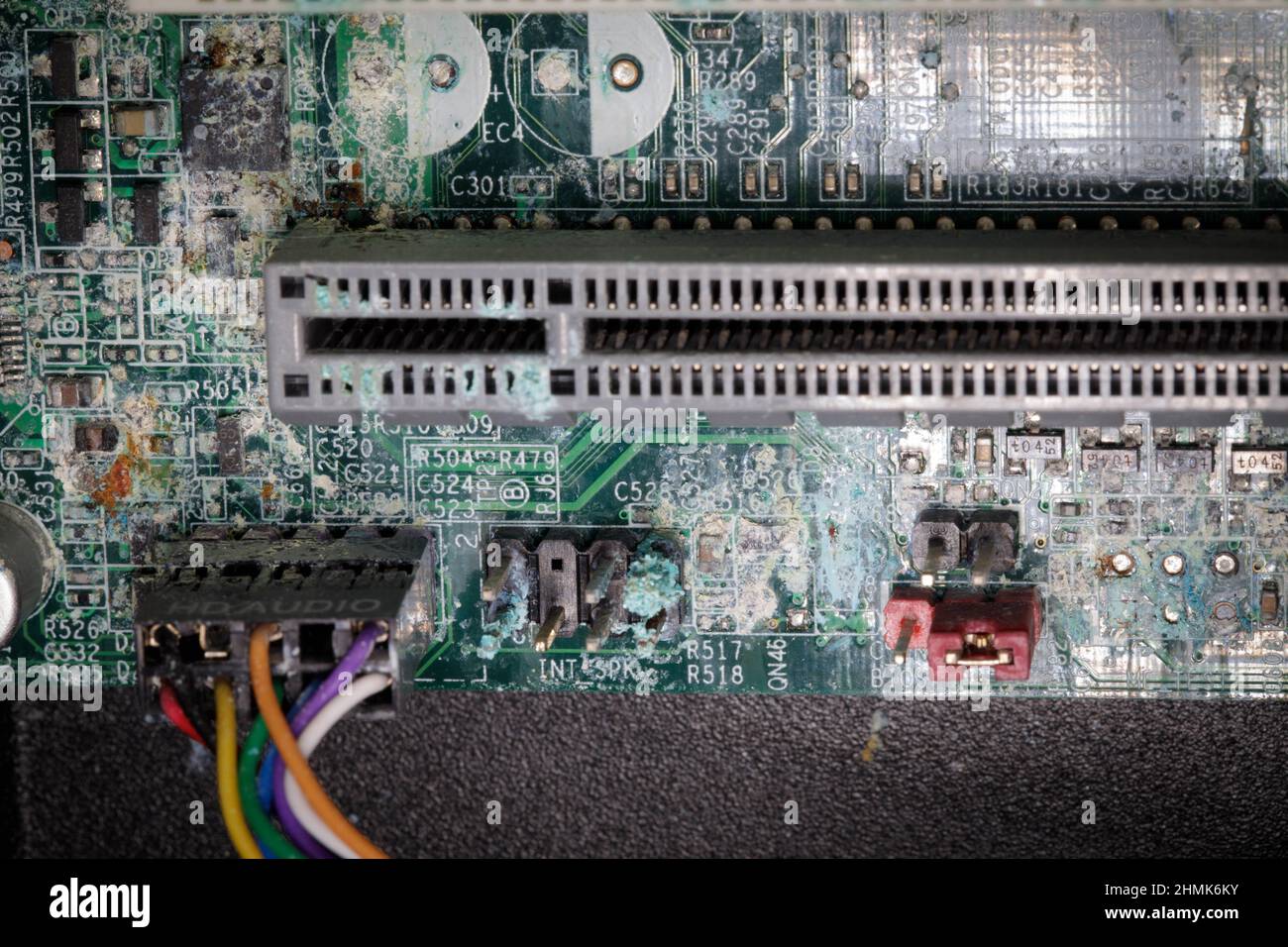 the mainboard of a computer is corroded due to water penetration Stock ...