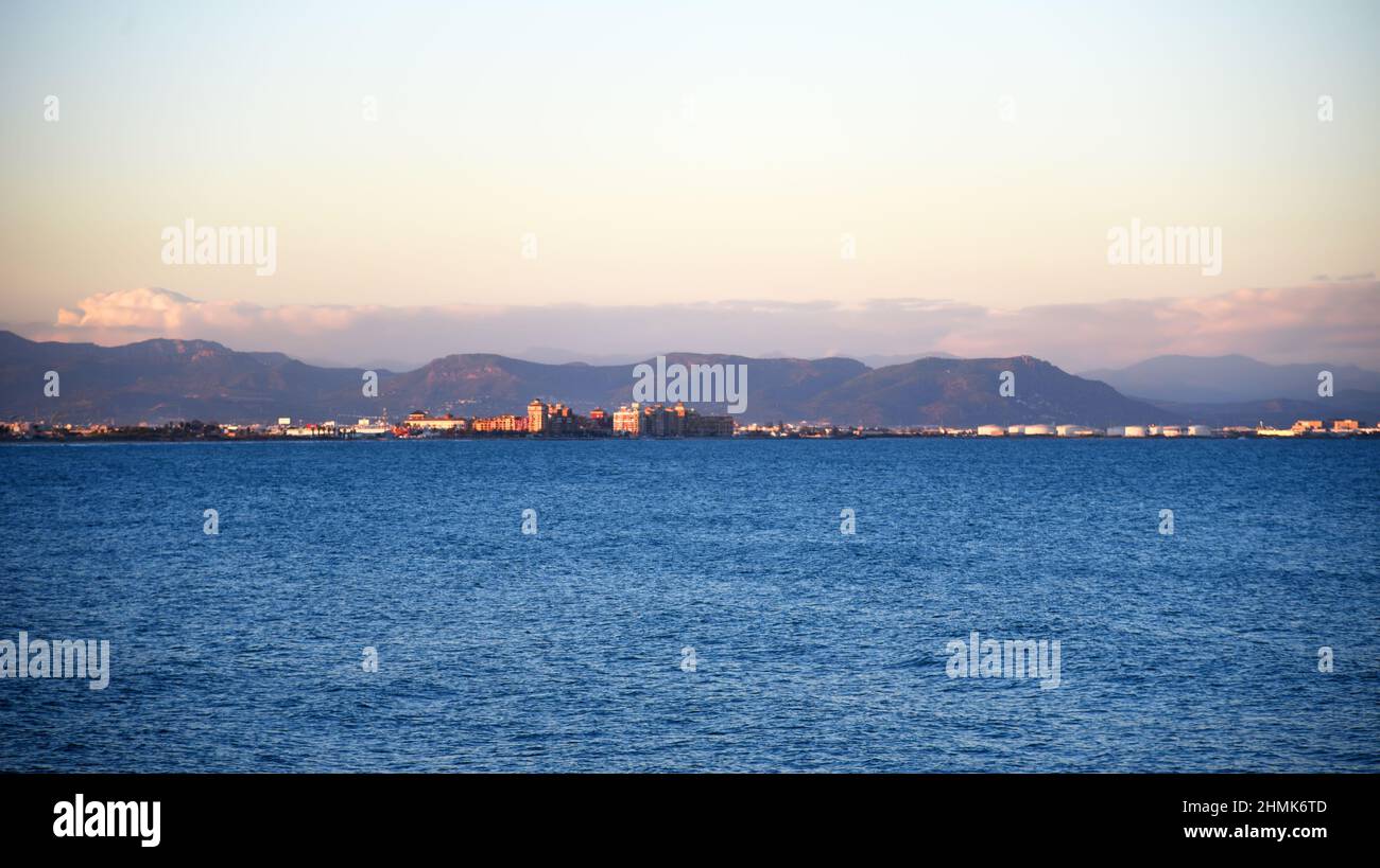 Coastline and beach on sunset. Mediterranean sea at Alboraya beach and ...