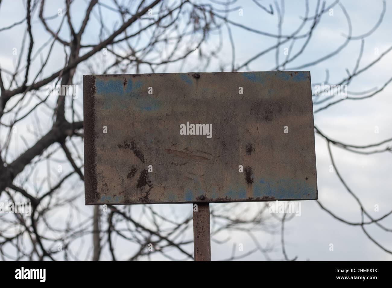 Blank, empty old rusty metal signboard with copy space for text on ...