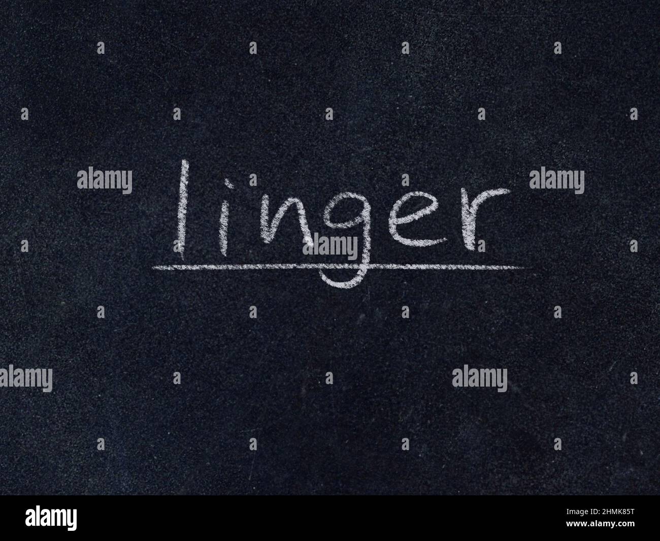 linger concept word on blackboard background Stock Photo - Alamy